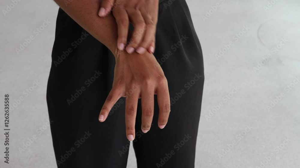 Young African woman scratching hand skin, concept of dry skin, allergic ...