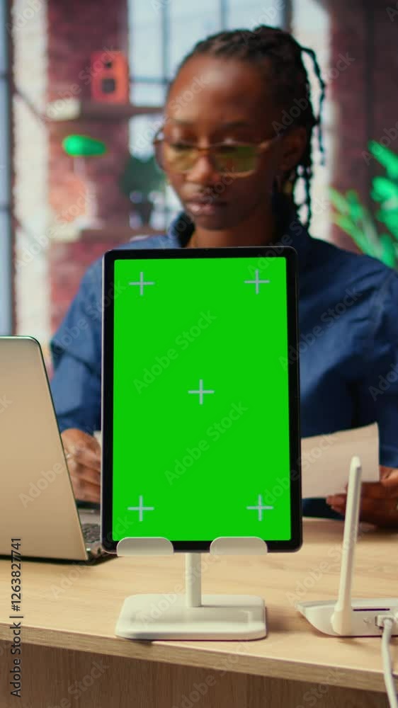 Black girl tries to fix an Wi Fi error by rebooting router next to ...