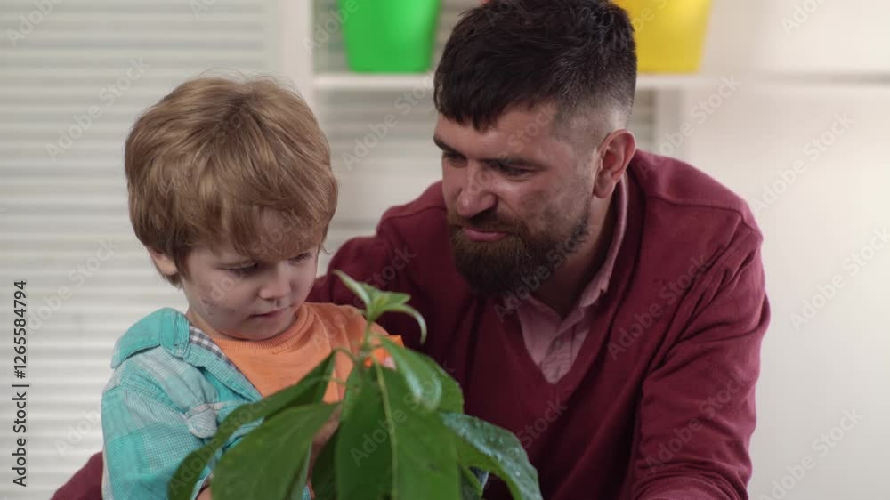 Father and son planting. Father and son potted plant. Father and son ...