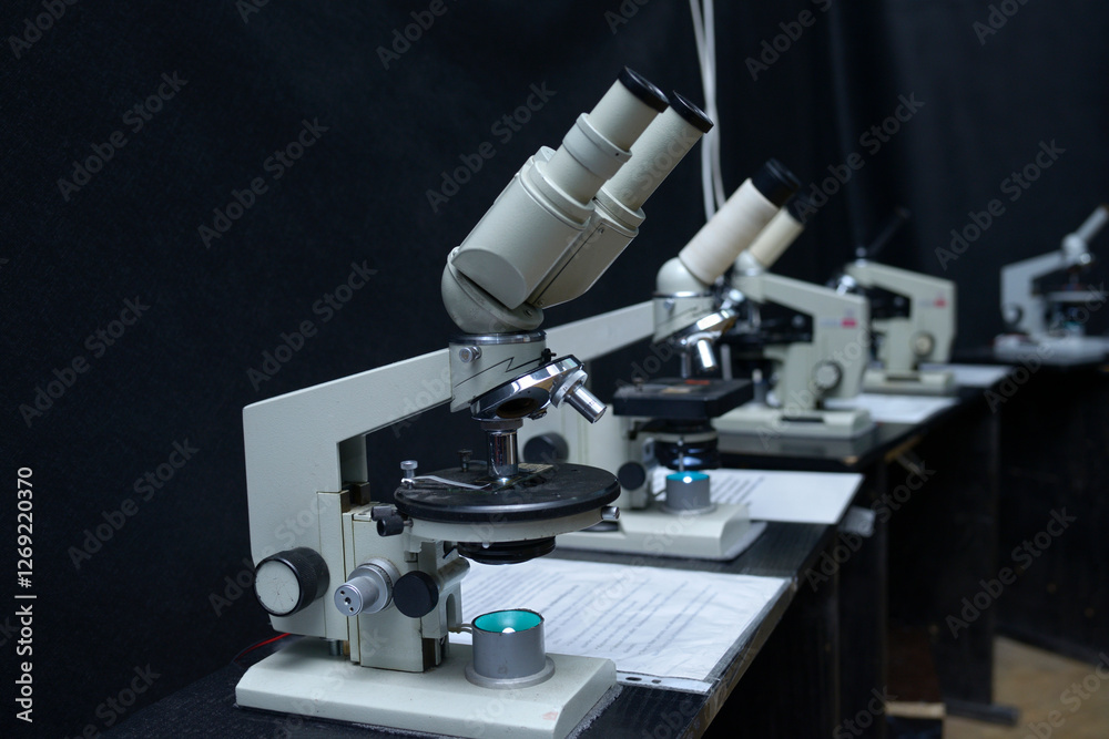 Poster Microscopes set on the worktable of the school lab – Wall Art ...