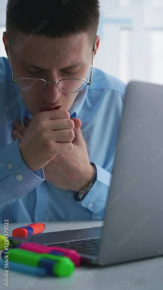 Man with flu and cold symptoms. A guy has a sore throat. The man coughs ...