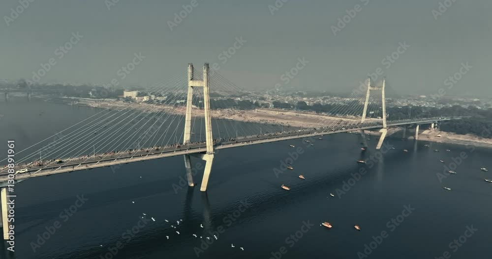 Cinematic aerial view of the New Yamuna Bridge, a stunning cable-stayed ...