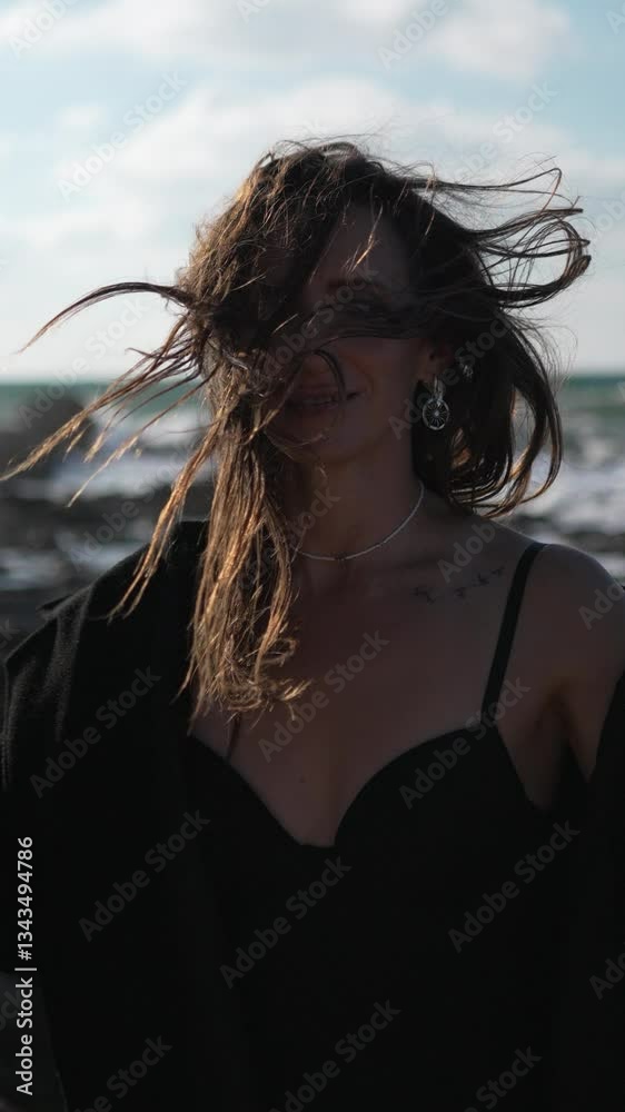 Woman Beach Wind Hair Blowing - A woman with long brown hair stands on ...