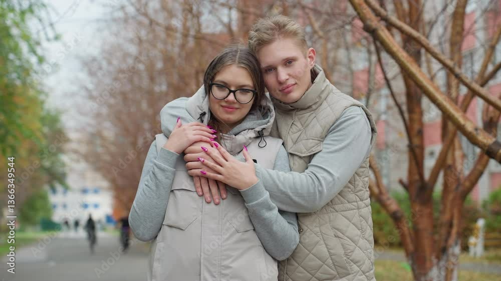 Beautiful moment of lovely couple warmly holding each other as man ...