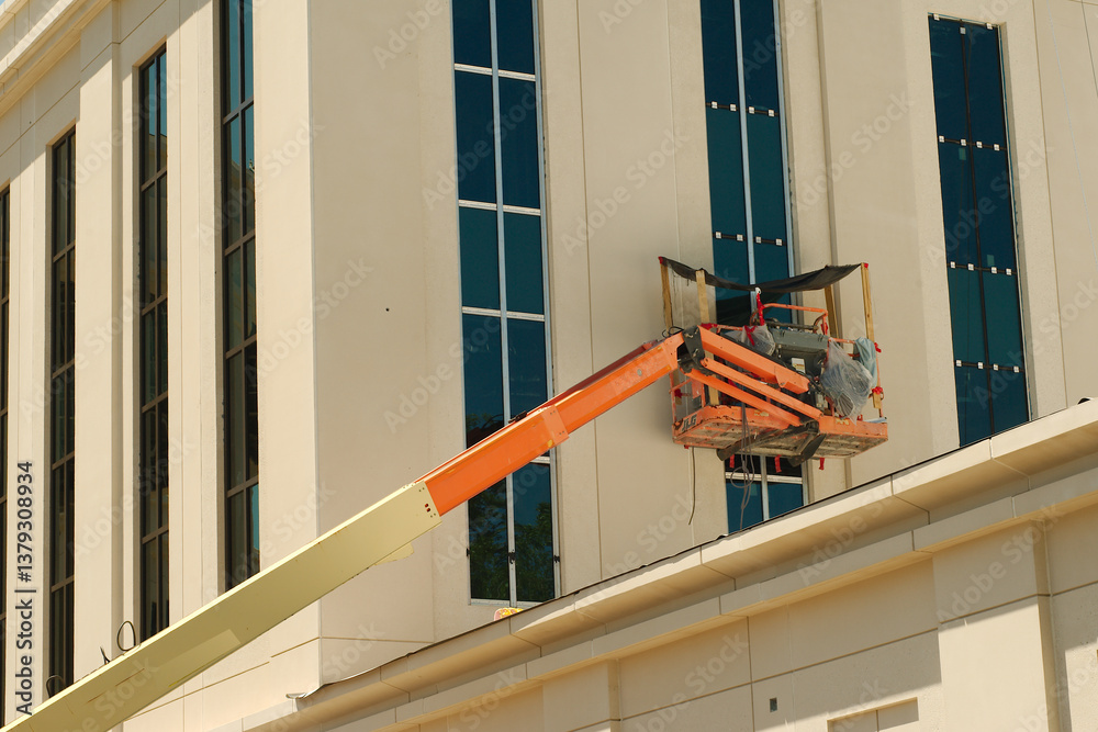 Poster Construction lift, specifically a boom lift articulating being ...