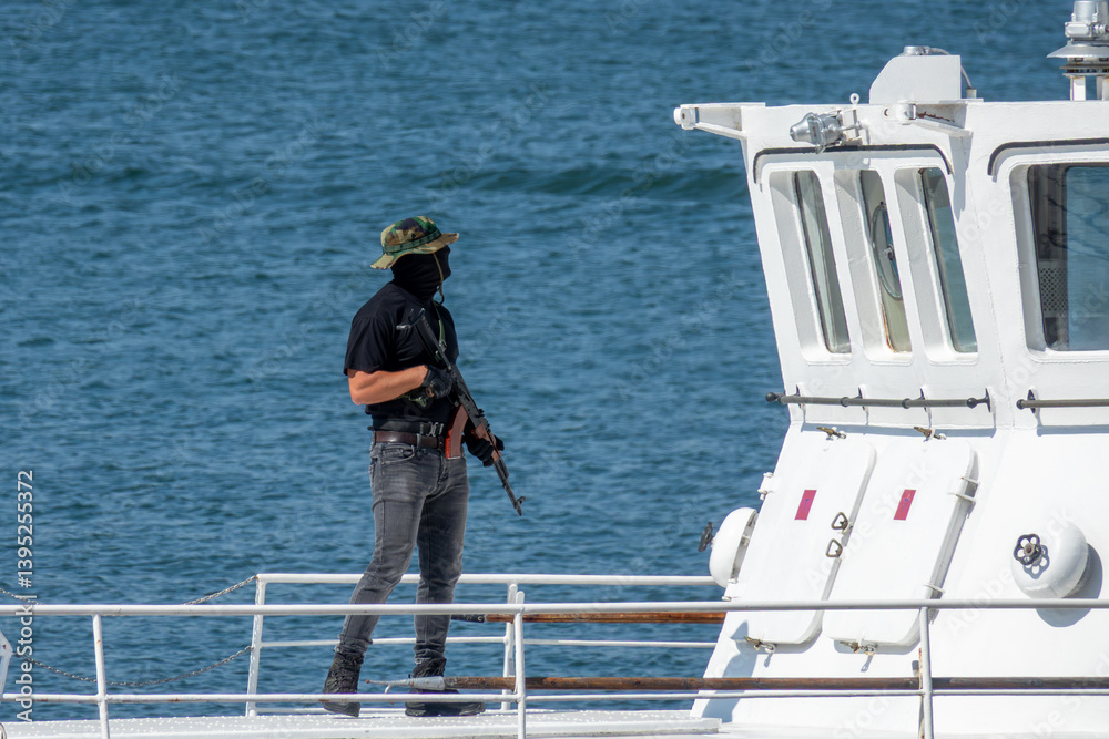 Poster Armed Security Guard on Patrol Boat – Tactical Man with Rifle on ...