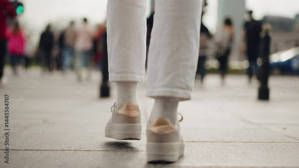 Back view following shot female feet steps walking pedestrian crossing ...