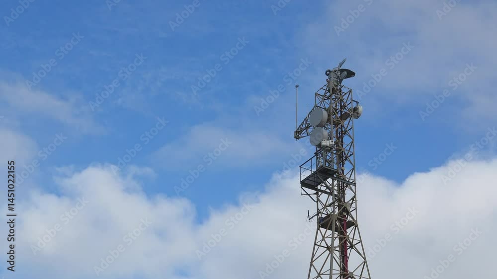 Tall SIVE radar tower rising, supporting multiple antennas and ...