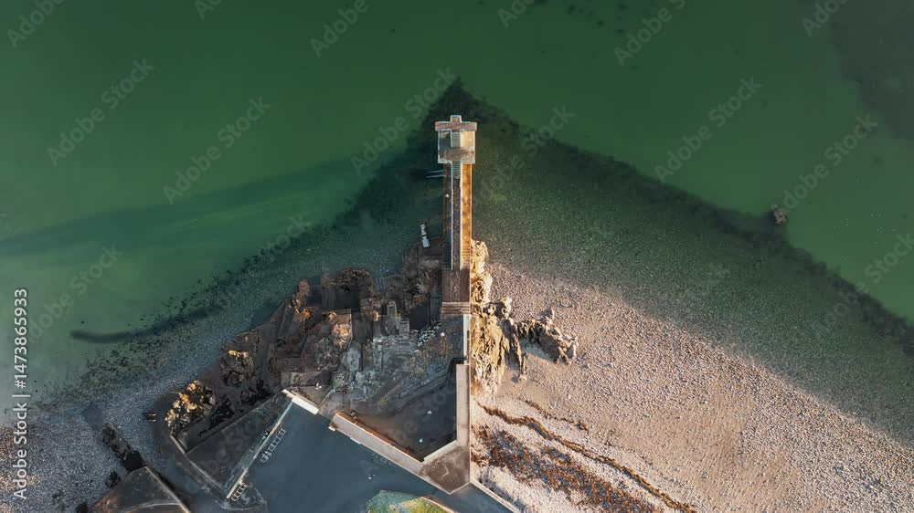 Top-down aerial timelapse of Blackrock's distinctive diving pier with ...