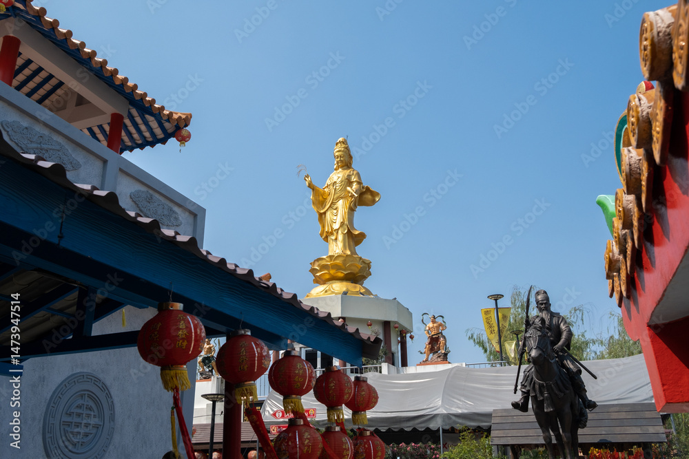 Poster Guanyin Statue at Vihara Ariya Guan Yu Shrine in Thailand, is a ...