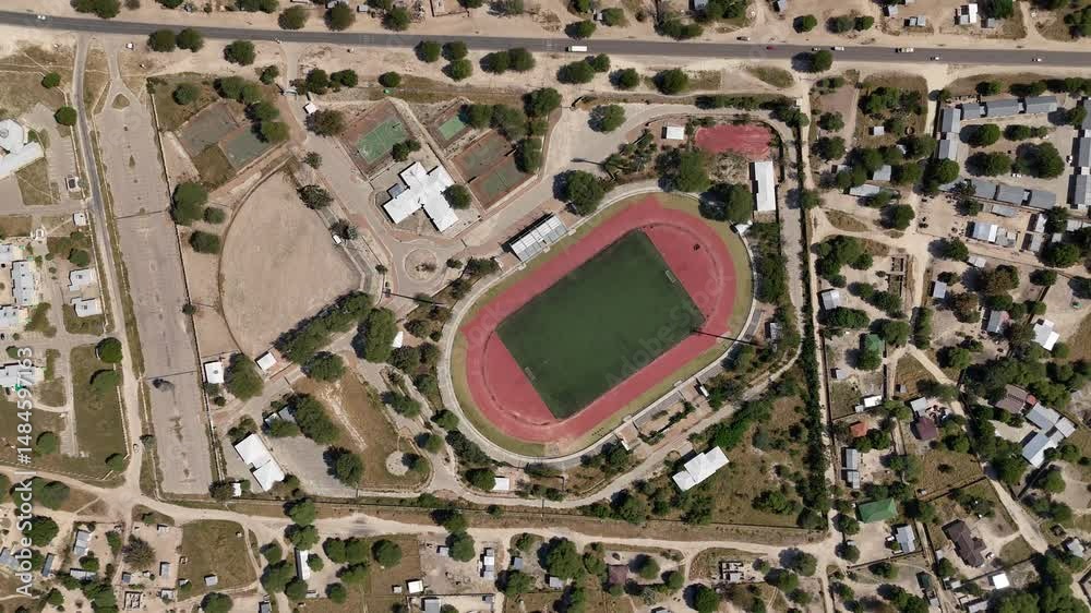 Maun Sports Complex Top - Down - 4K slow smooth Establishing Drone shot ...