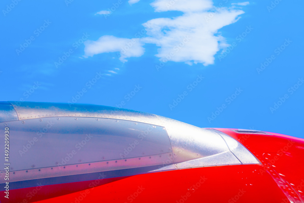 Poster Shiny aircraft surface likely fuselage in flight, with a vibrant ...