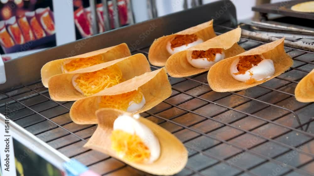 Tacos dessert shelfThai Street Food Chef Removing Khanom Bueang, Crispy ...