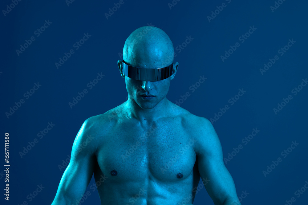 Poster Muscular man with a bald head showcases futuristic fashion ...