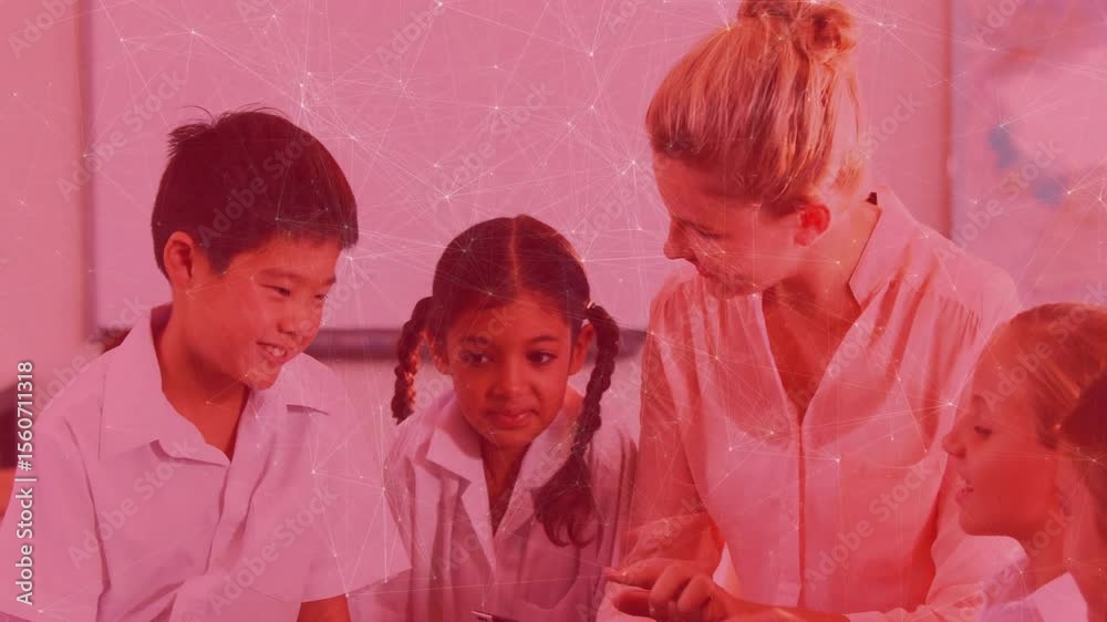 Female teacher tapping tablet screen and guiding students leaning ...