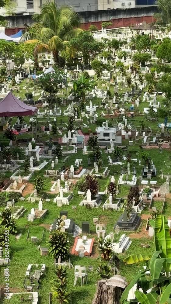 Malaysia, Kuala Lumpur, 24 November 2025 – the city's Muslim cemetery, an ancient Islamic shrine ...