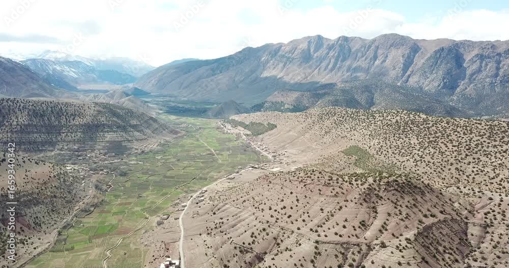 "Lush farmland spreads across stepped hillsides in Morocco's Atlas ...