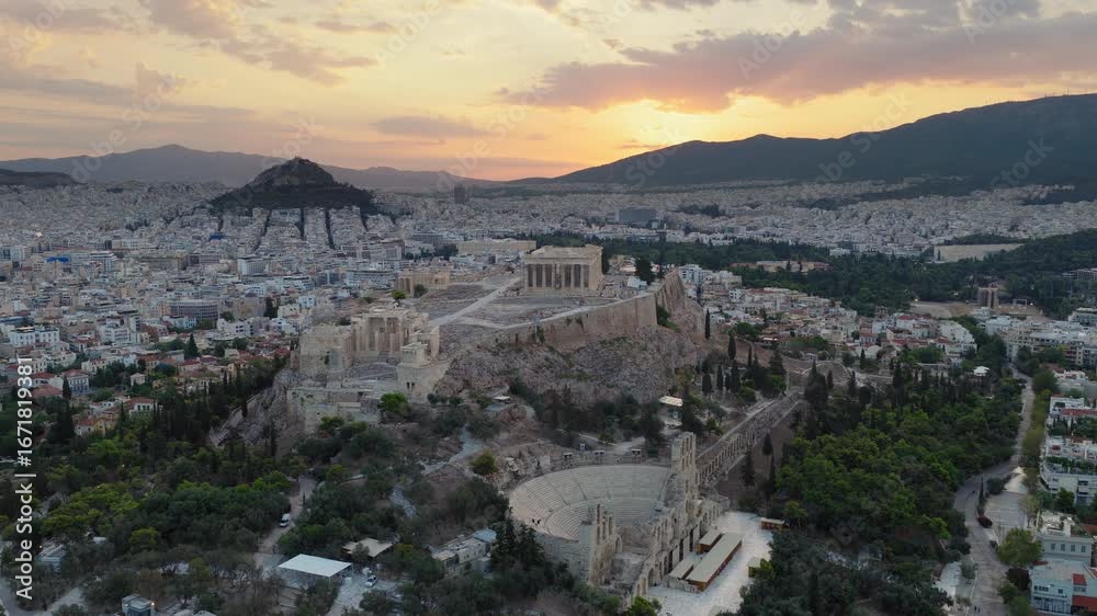 Drone footage flying over the Acropolis and Parthenon in Athens at dawn ...
