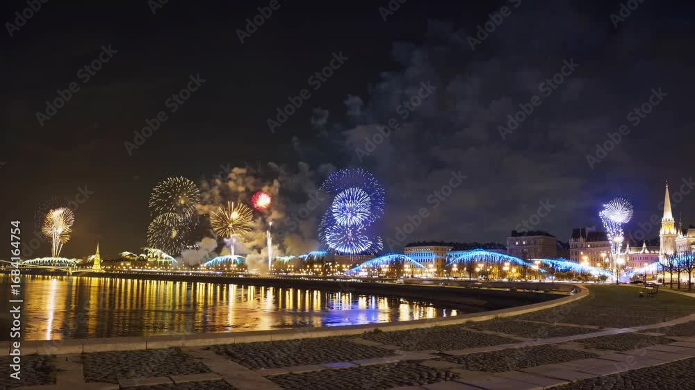 Fireworks Display Lighting Up the Night Sky Over a Scenic Waterfront in ...