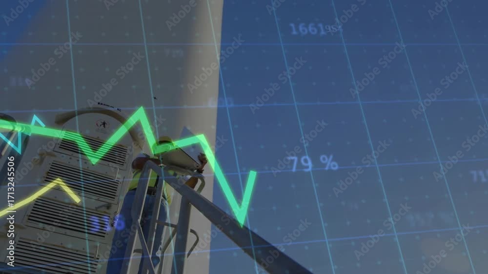 Technician on tower opening laptop, reading wind turbine metrics for ...