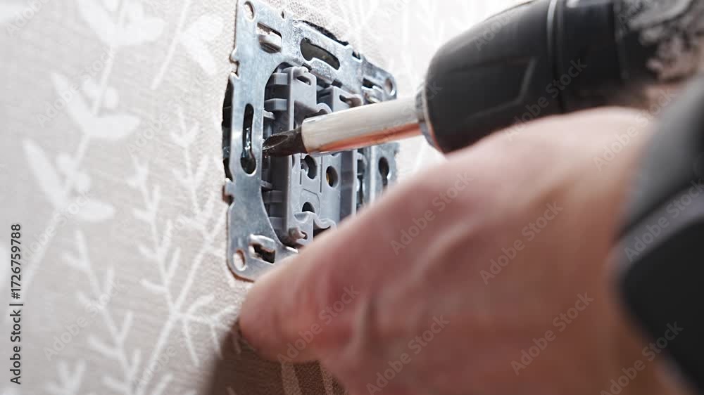 Step-by-step guide on securely mounting an electrical outlet using a ...