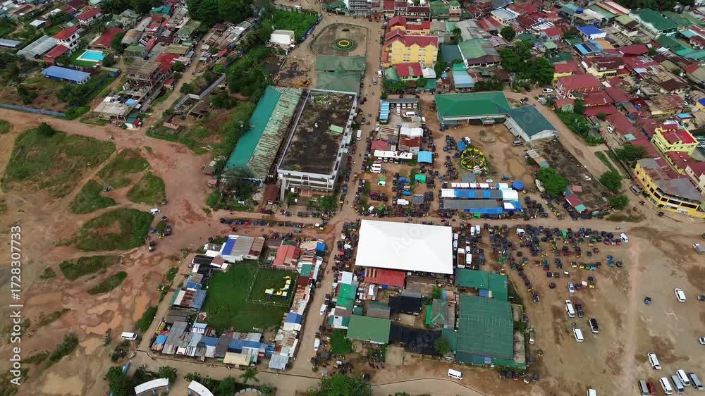 Forward drone view over central Coron near the barangay hall and ...