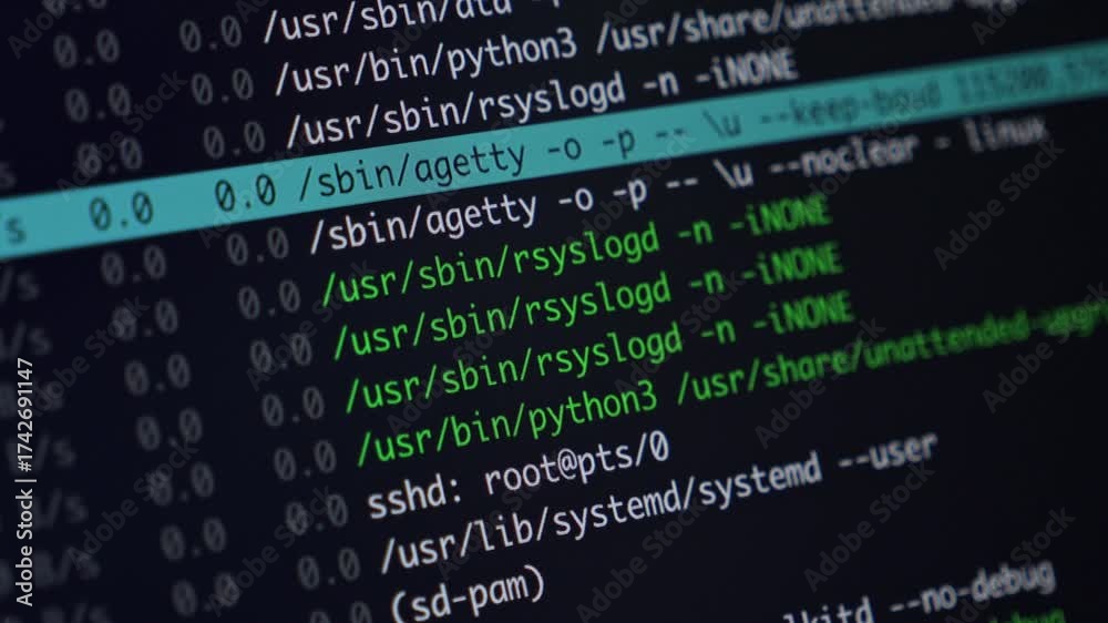 Digital screen displaying complex green programming code and active ...