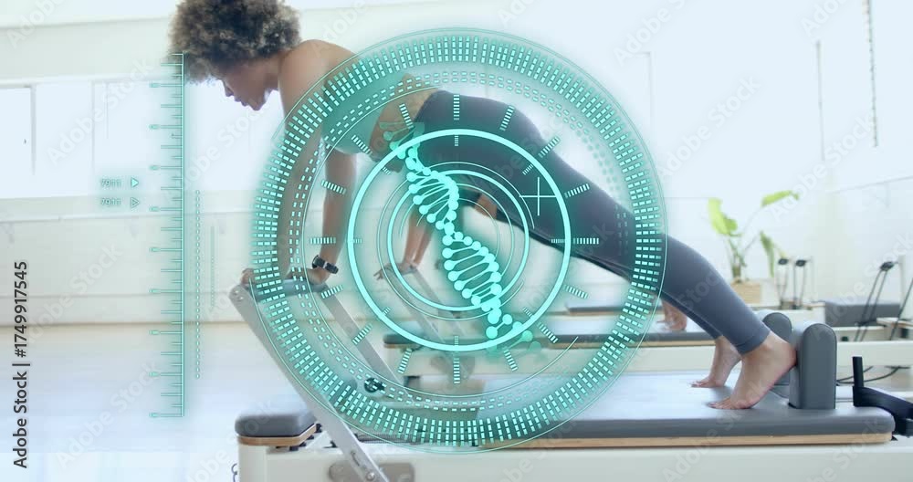 Woman stepping onto Pilates reformer sliding carriage into pike, pulse ...