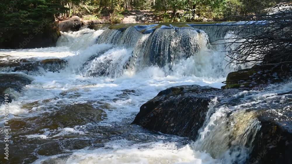 Upper Bond Falls cascading over rock ledges in Michigan’s Upper ...