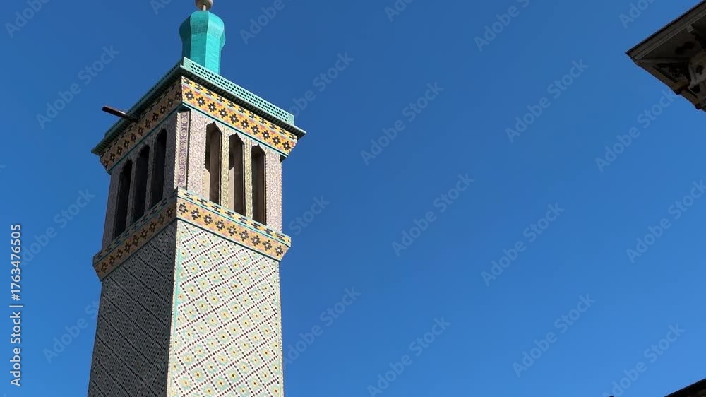 Persian blue tile design of islamic minaret with traditional ...