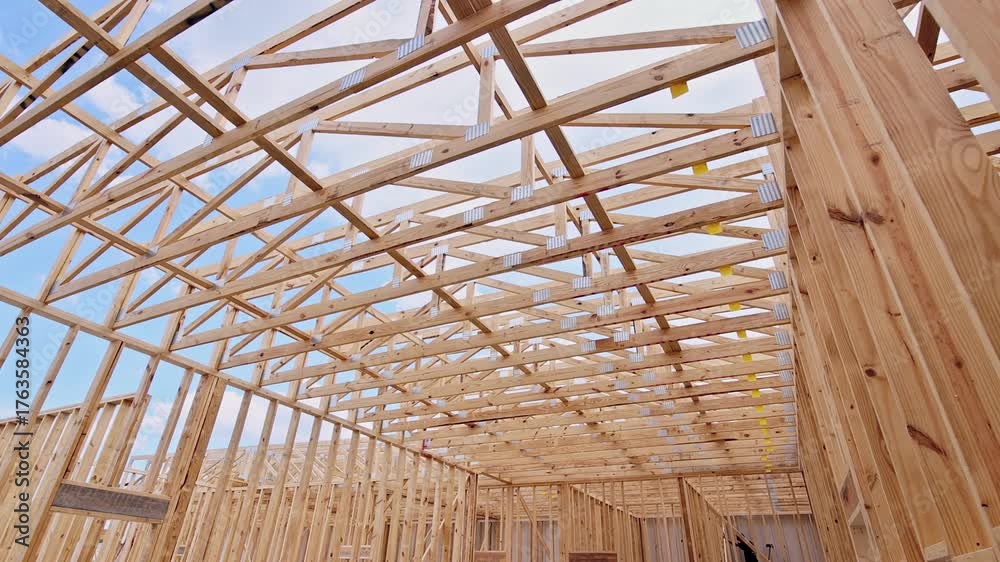 Wooden beams create strong framework beams for new house construction ...
