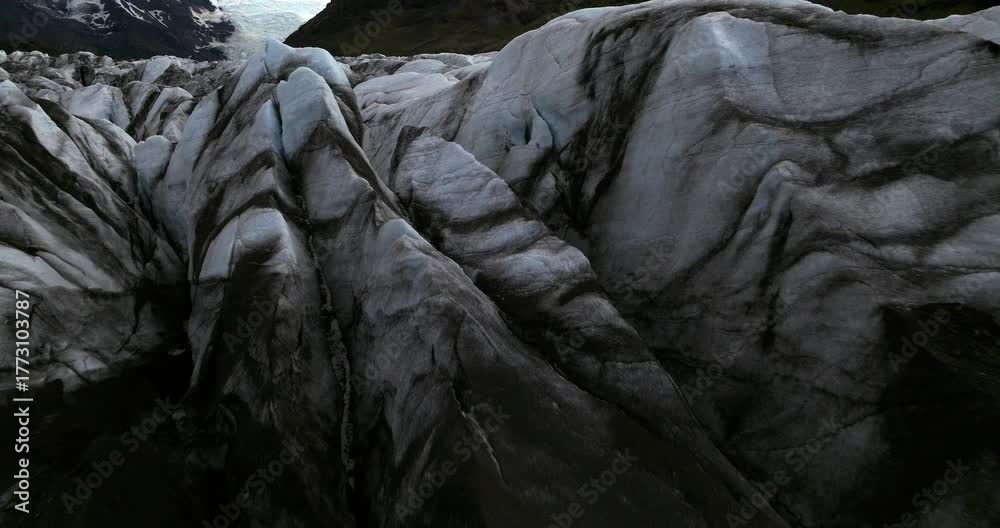 Aerial drone footage flying over the melting glaciers of Iceland ...