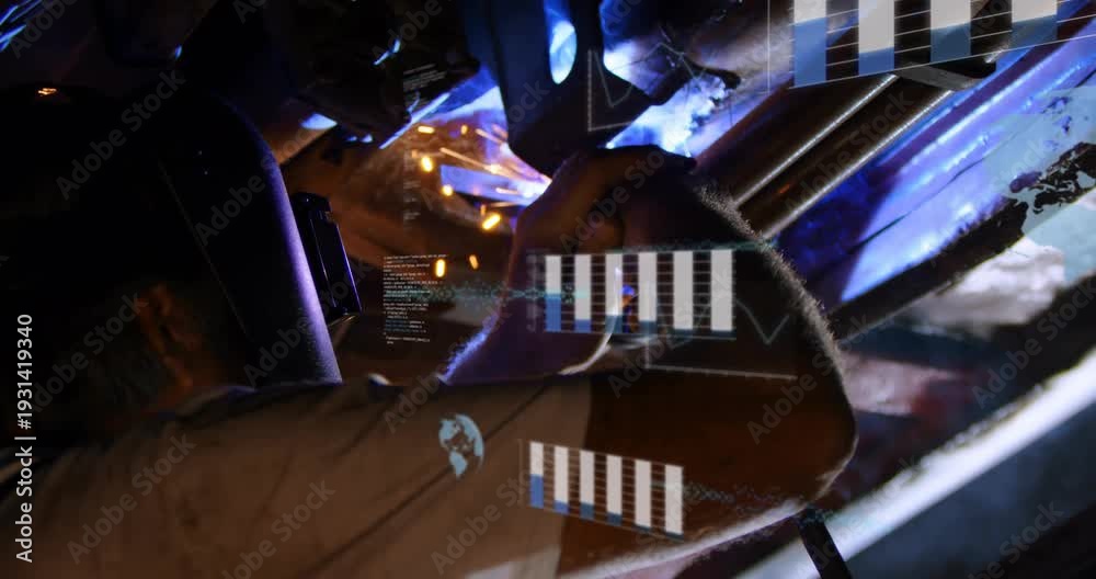 Welder activating torch and welding joint, producing sparks while HUD ...