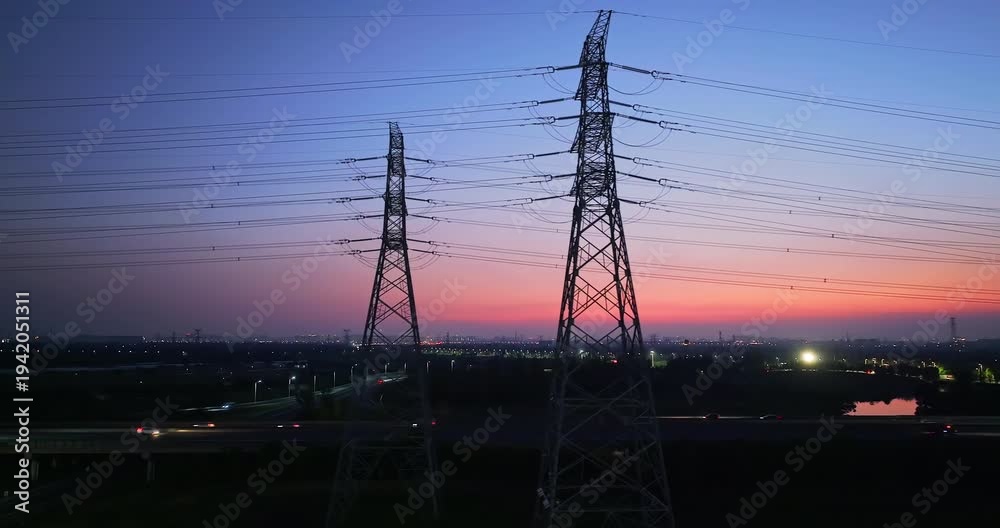 Electricity transmission pylons and high voltage power lines standing ...