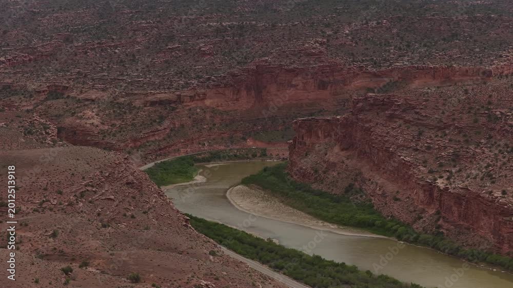Aerial close up of Colorado River at Dewey Bridge in Utah in red ...