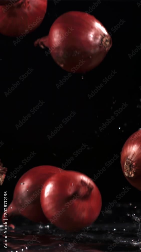 Onion falls on the table. Filmed is slow motion 1000 fps. High quality ...
